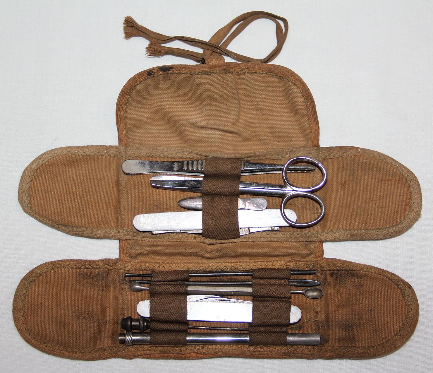 B330. EARLY WWI OFFICERS ROLL UP MEDICAL KIT WITH INSTRUMENTS - B & B ...