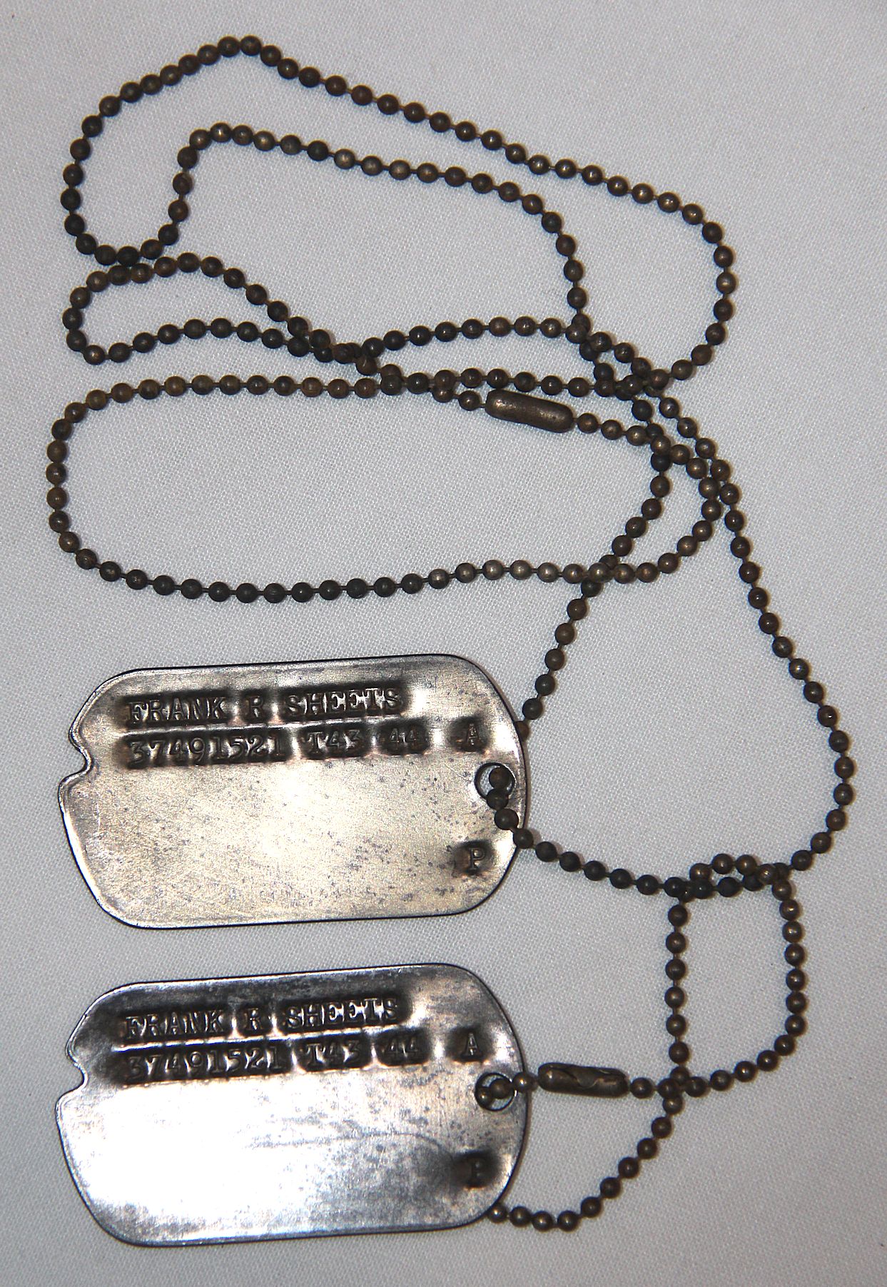 H149. NAMED WWII DOG TAGS ON TWO PIECE BEADED CHAIN - B & B Militaria
