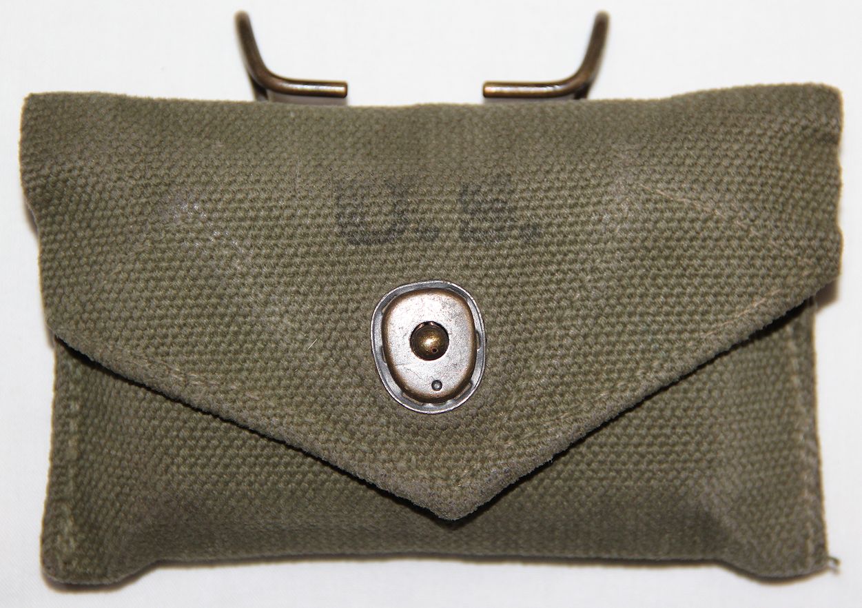 E500. WWII CARLISLE BANDAGE POUCH WITH UNOPENED BANDAGE - B & B Militaria