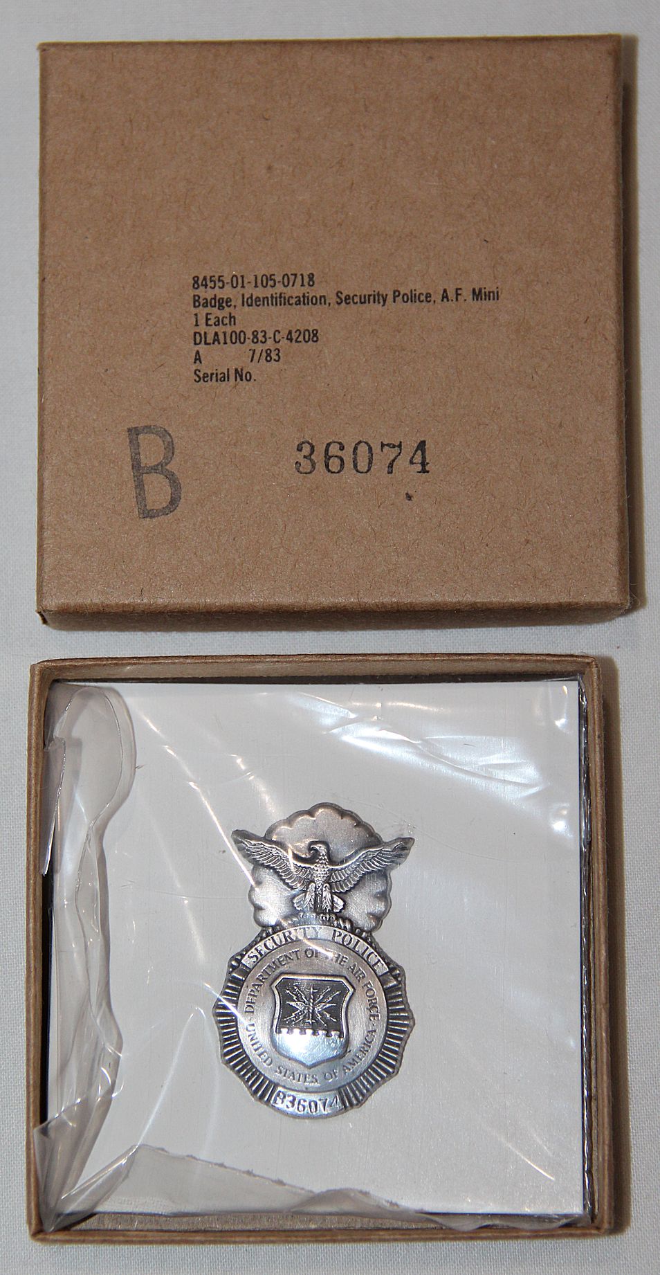 U079. MINI USAF SERIAL NUMBERED SECURITY POLICE BADGE - B & B Militaria