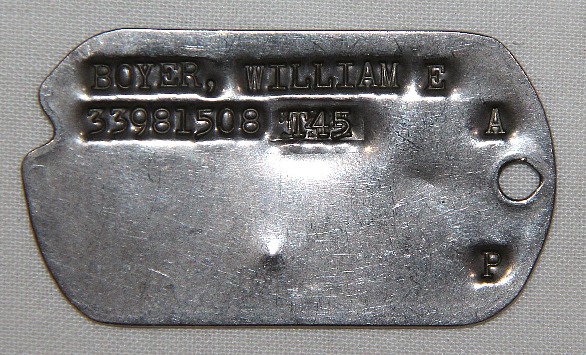 H249. NAMED WWII DOG TAG - B & B Militaria