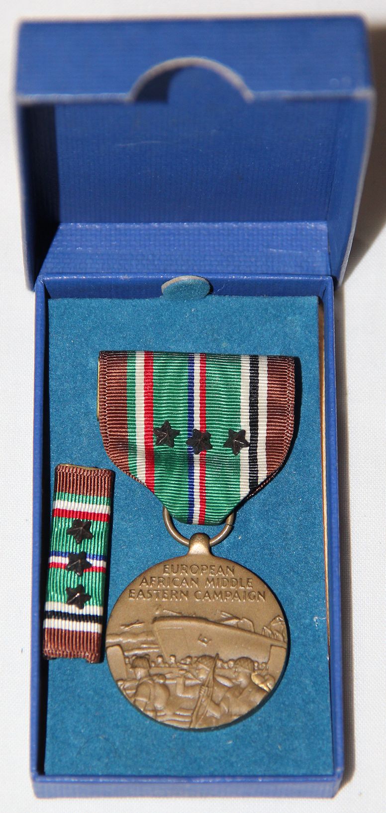 H269. WWII EAME MEDAL AND RIBBON BAR IN BOX WITH 3 CAMPAIGN STARS - B ...